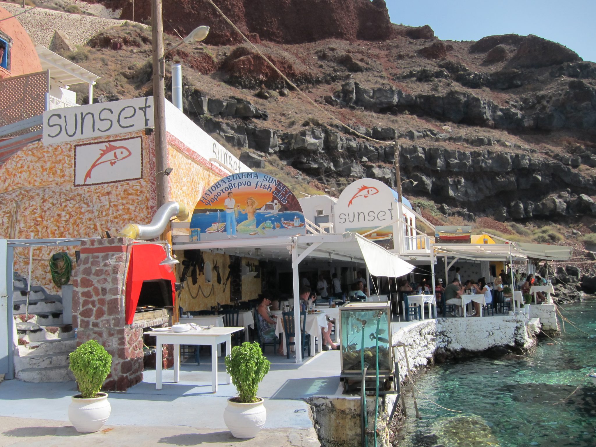sunset tavern santorini - Enchanted Honeymoons